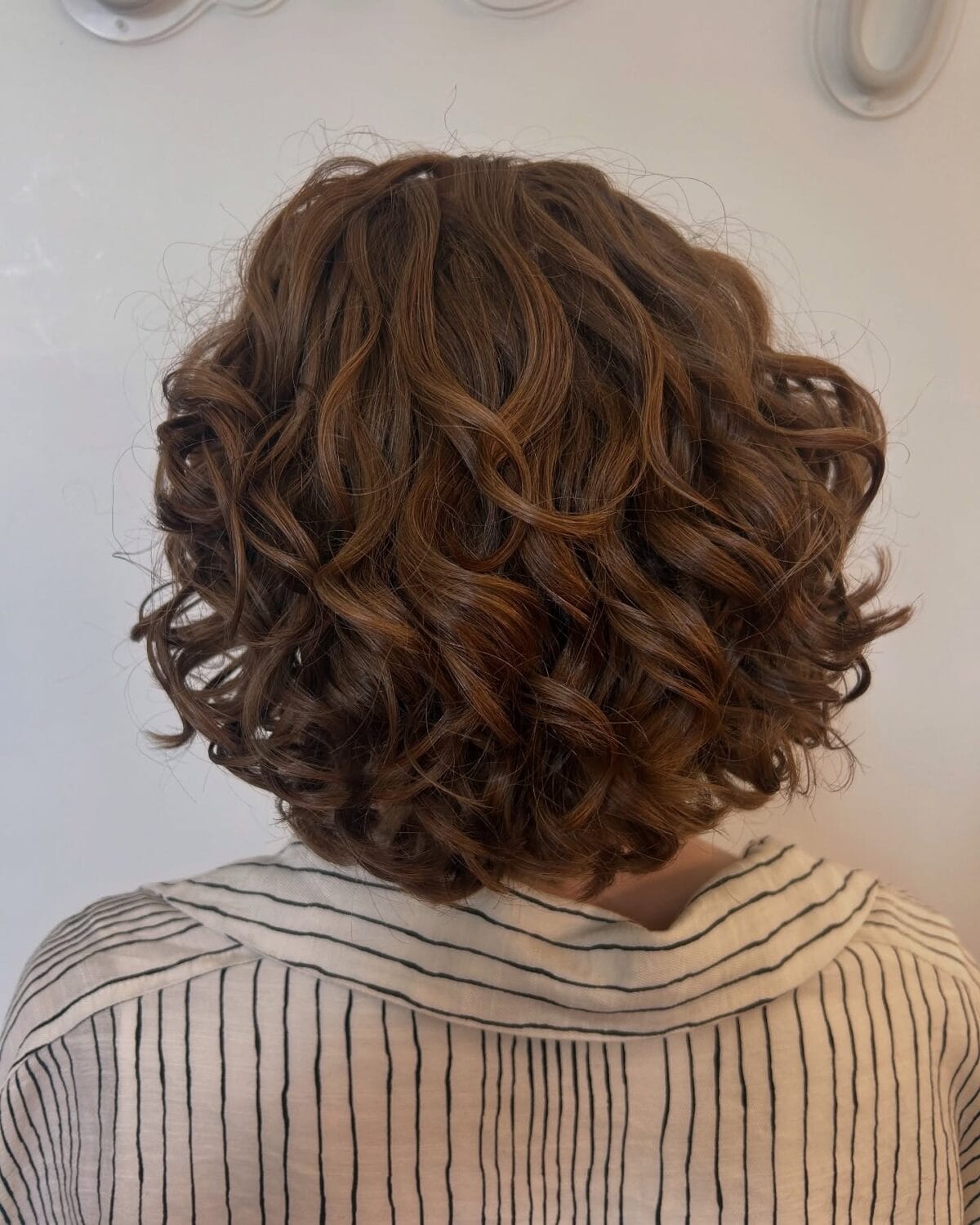 19 Layered Short Curly Hairstyles For Added Movement And Shape