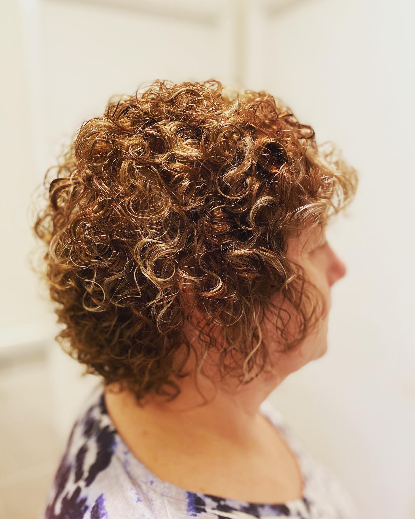 19 Layered Short Curly Hairstyles For Added Movement And Shape